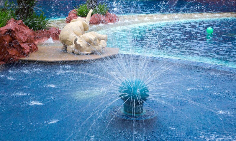 The fountain in the pool. stock image. Image of swimming - 303811245
