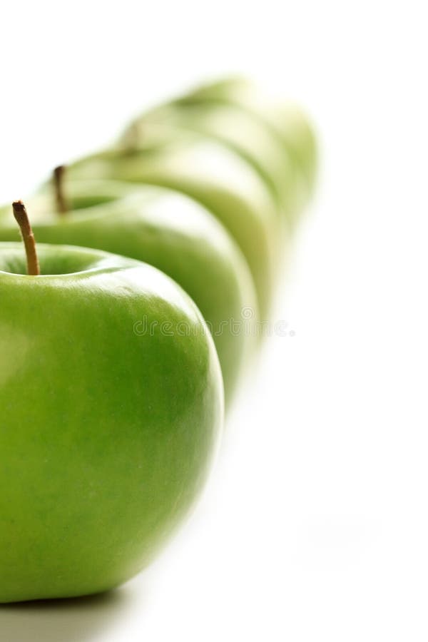 Line of green apples stock image. Image of eating, green - 13056693