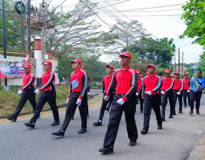 A Line of High School Students Participating in a Marching Competition ...