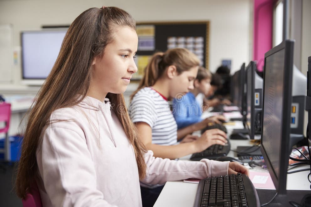 Line of High School Students Working at Screens in Computer Class Stock ...