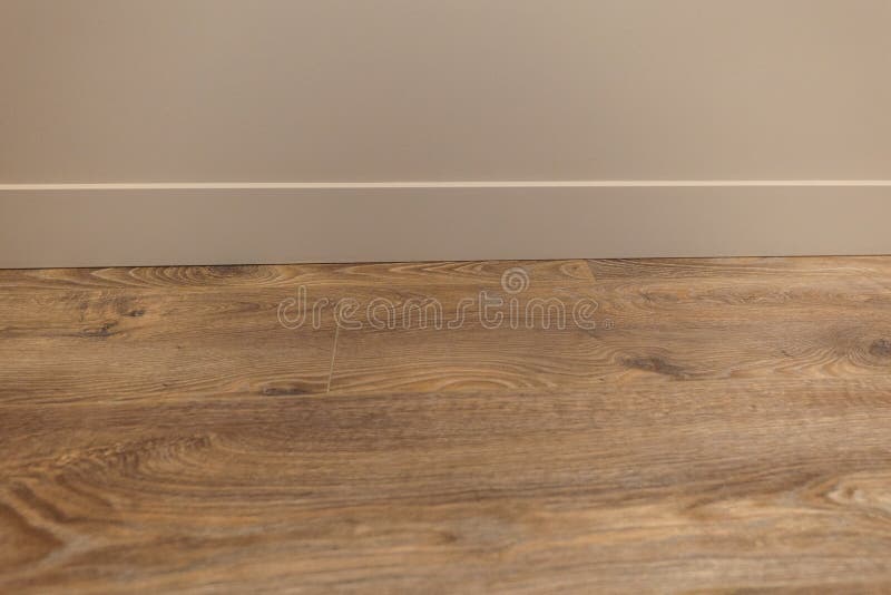 Line of Junction of Laminate and Plinth. Apartment Interior Stock Photo ...