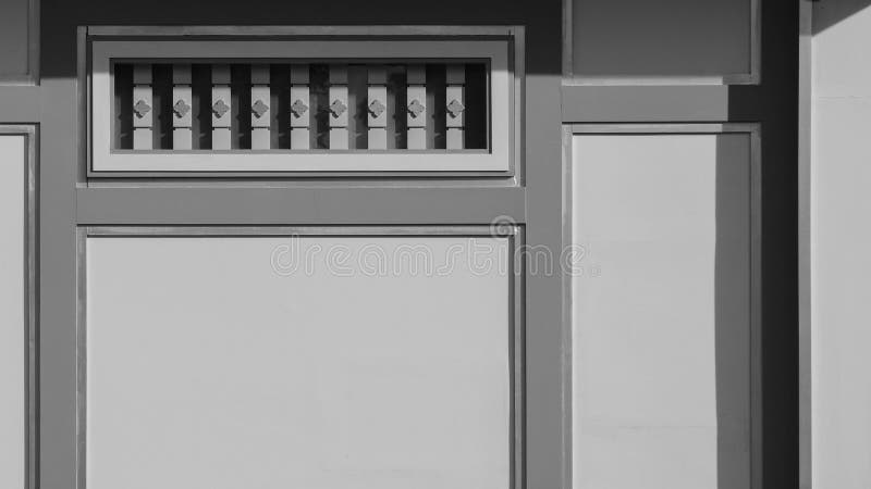 Line of Low Relief Sculpture at Grey Wood Wall with Shadow Stock Photo ...