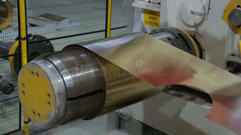 The Line for Machining of a Roll of Sheet Metal Stock Footage - Video ...