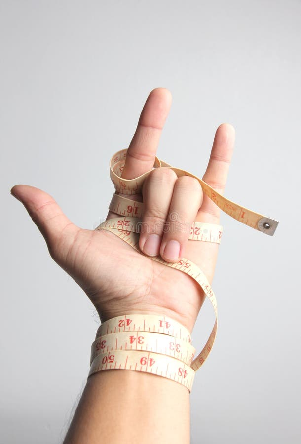 Line measurement in hand stock image. Image of rolled - 39962571