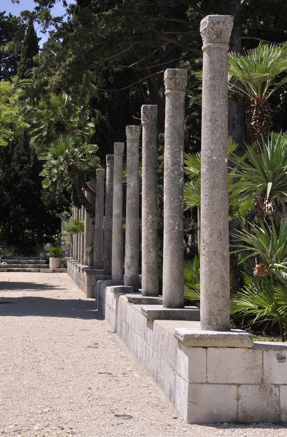 A line of old pillars stock image. Image of proud, alley - 25946705