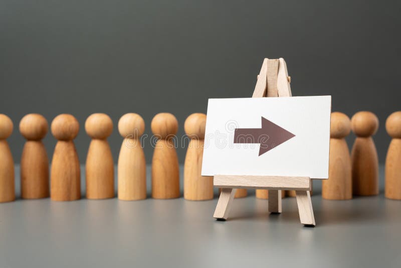 A Line of People and an Arrow on a Sign. Queue Stock Photo - Image of ...