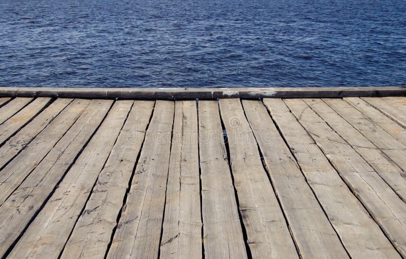 The Line between a Plank Pier and Water. Beautiful Background. Stock ...