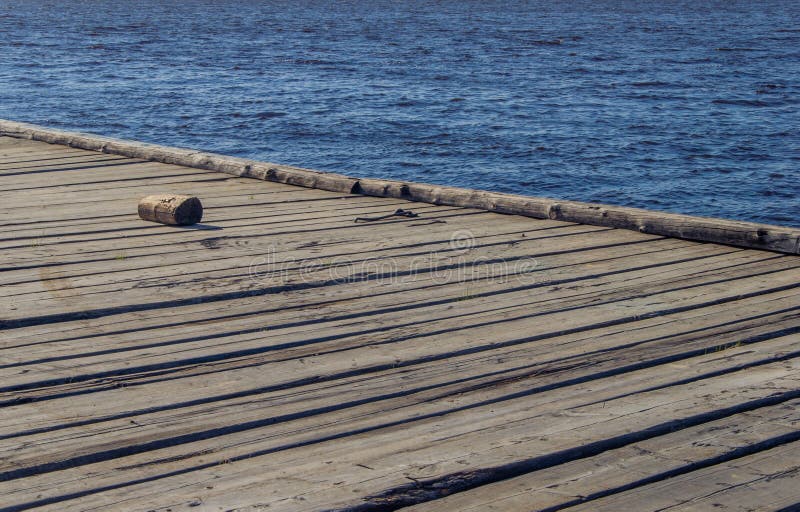 The Line between a Plank Pier and Water. Beautiful Background. Stock ...