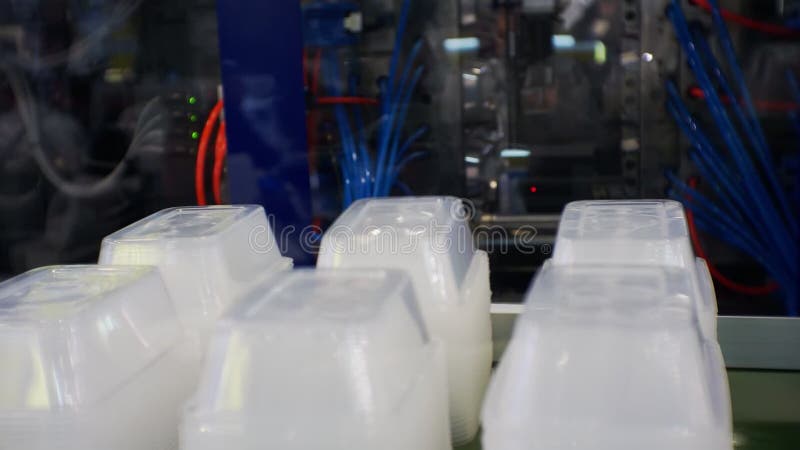 Line Production of Plastic Disposable Containers. Stock Video - Video ...