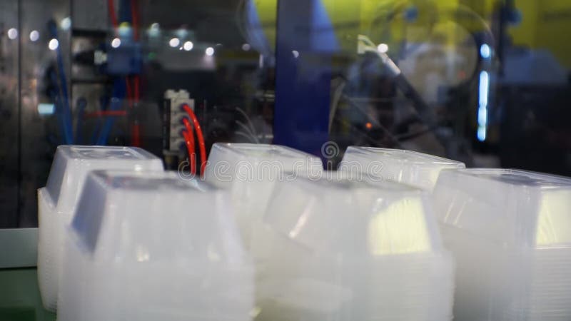 Line Production of Plastic Disposable Containers. Stock Video - Video ...