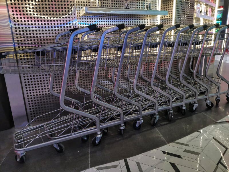A line of shopping carts stock image. Image of supermarket - 204815177