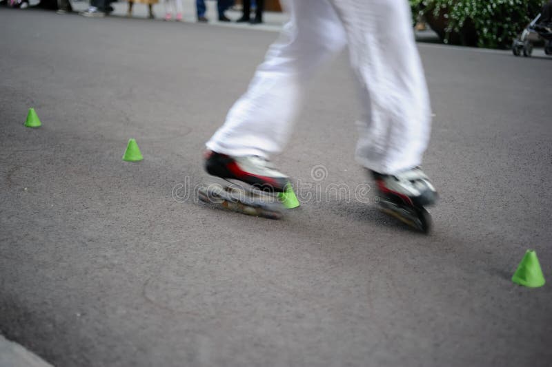 In-line skating slalom stock image. Image of sport, skating - 10926813