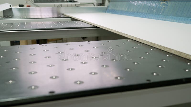 Line Wood Furniture Making Machine. Cutting Sheets of Wood Chipboard ...