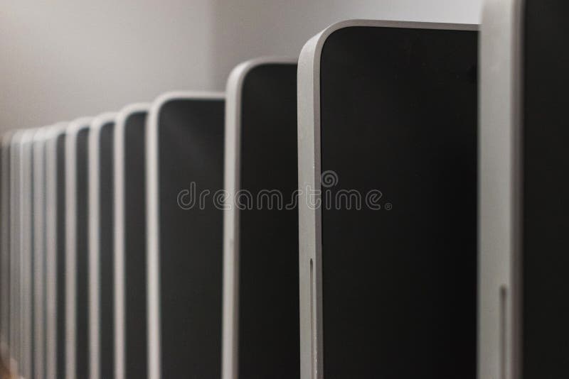 Lined Up Black Computer Screens Seen from Behind Stock Photo - Image of ...
