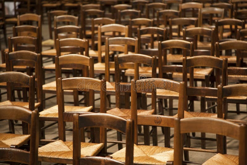 Lined Wooden Chairs stock image. Image of wooden, absence - 16212961