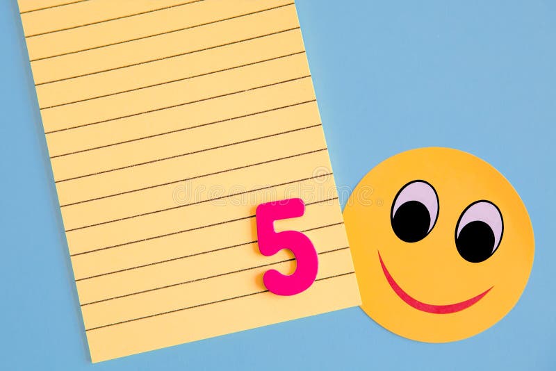 A Lined Yellow Notepad with the Number Five and a Smiling Yellow Smiley ...