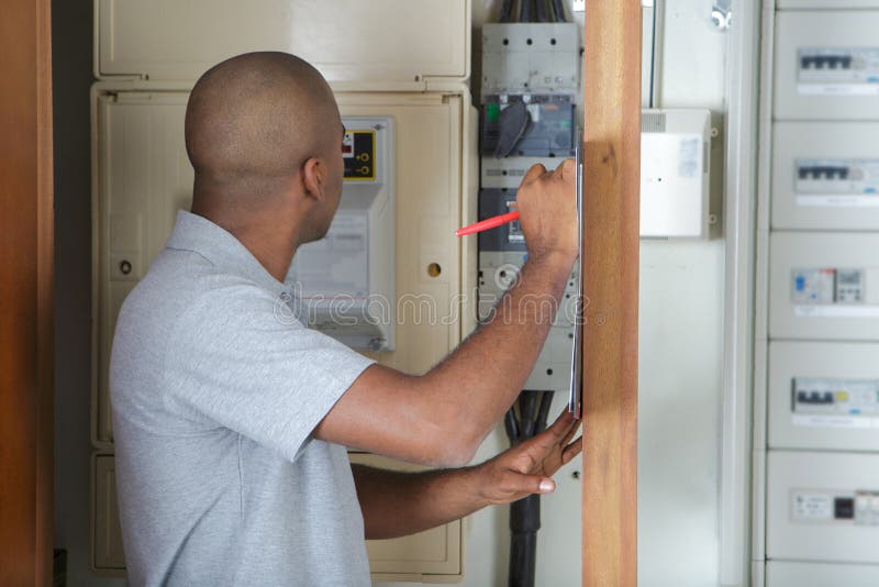 Lineman checking the panel stock image. Image of electrician - 121671691