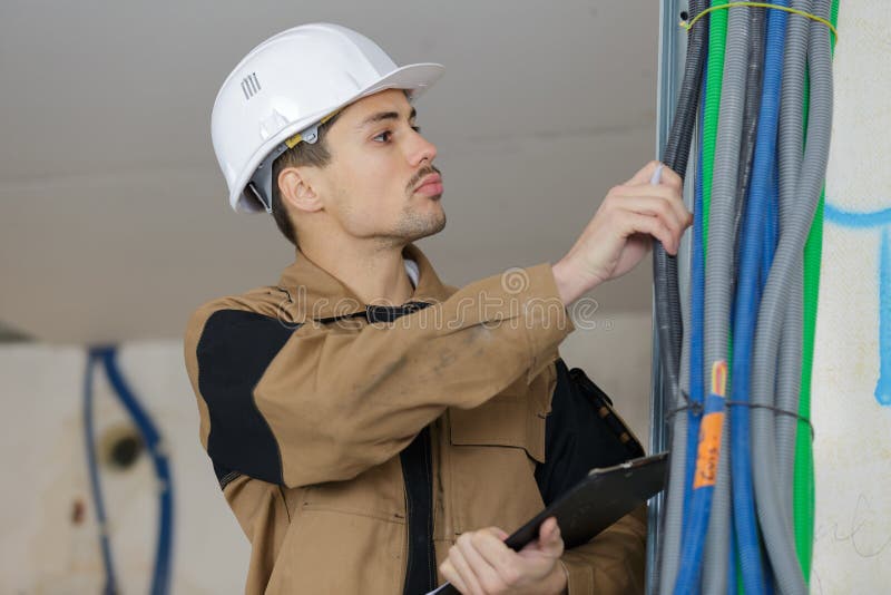 Inspecting Electrical Cord Stock Photos - Free & Royalty-Free Stock ...