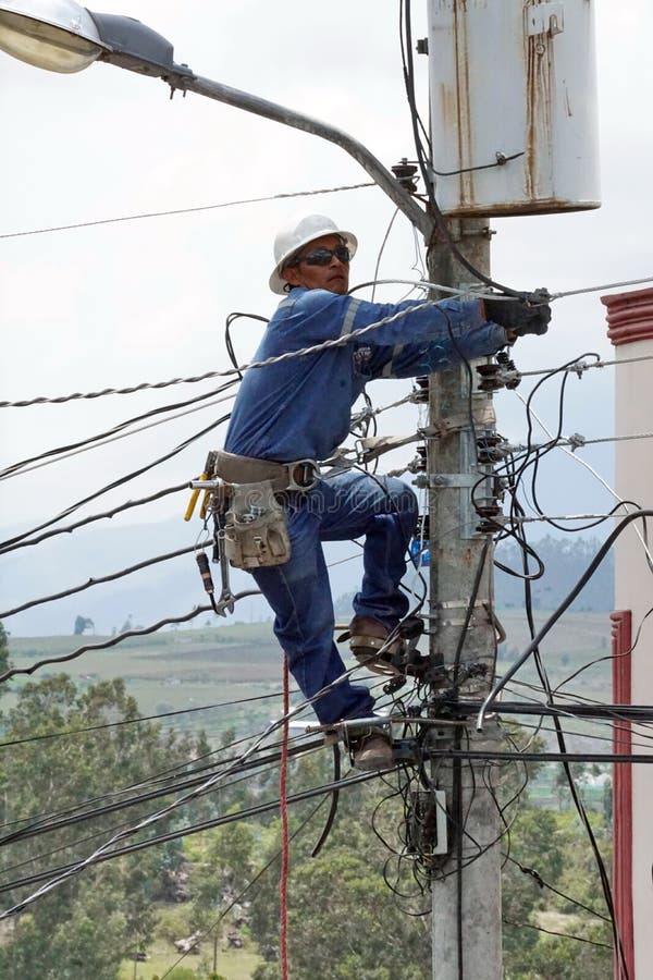 Lineman on a power pole editorial stock image. Image of ecuadorian ...