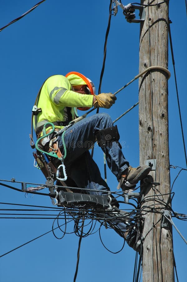 Lineman at work stock image. Image of lineman, risky - 59384393