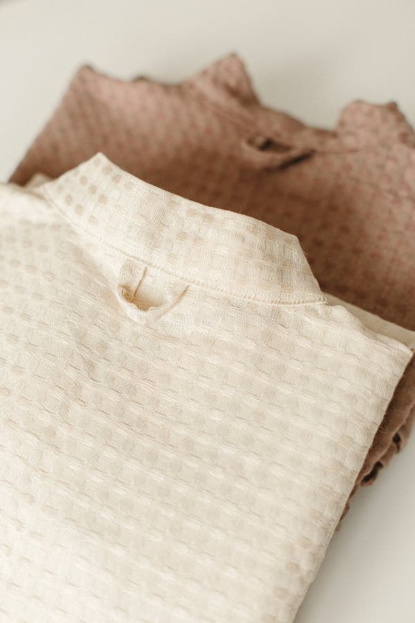 Linen Bathrobe is Folded, Lies on the Table. Stock Photo - Image of ...