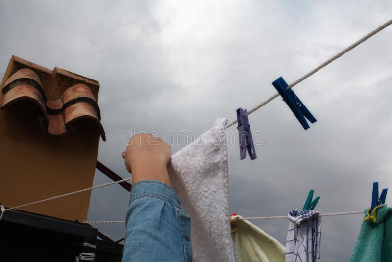 Linen dries in the rain stock image. Image of hanging - 107005943