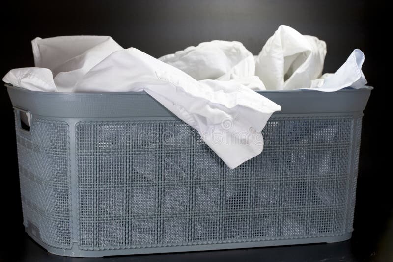 Linen Prepared for Washing in a Basket with Washing Means. Close Up ...