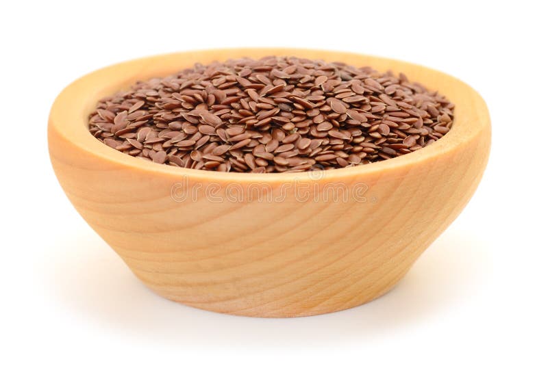 Linen seeds in wooden bowl stock photo. Image of diet - 192827868