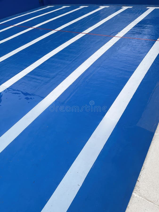 Lines of the Bottom of a Half Filled Blue Pool with a Composition with ...