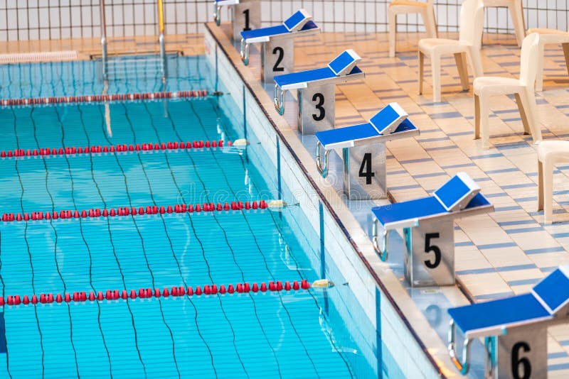 Lines in a swimming pool stock image. Image of sport - 246356851