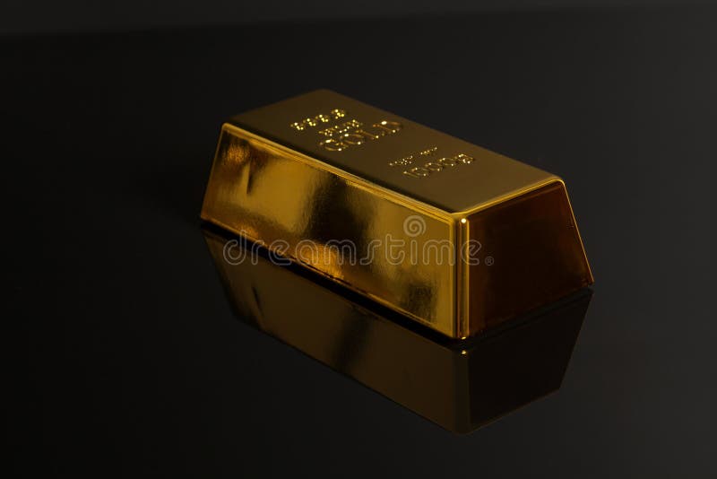 Lingote De Oro Aislado En Fondo Negro Imagen de archivo - Imagen de ...
