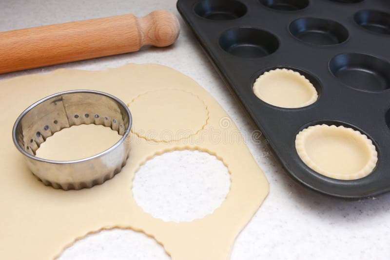 Rolling Pin and Cutter on Fresh Pastry, Cutting Out Circles Stock Photo ...