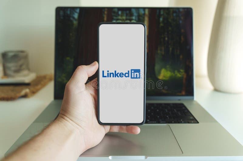 Linkedin Application Logo on Smartphone Screen in Front of Laptop ...