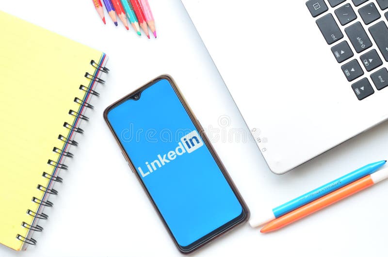 Linkedin Apps on Smartphone with Laptop Pencil and Book Editorial Photo ...