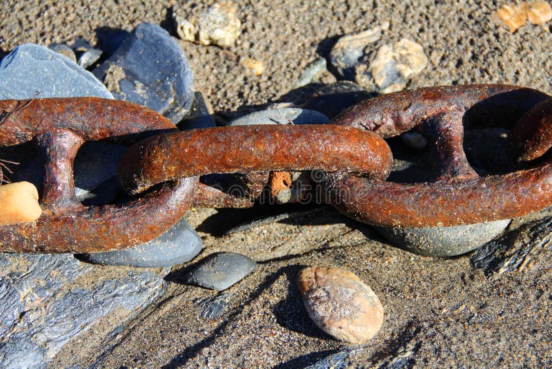 Links in the Chain - Rusty Boat Chain on the Beach Stock Photo - Image ...
