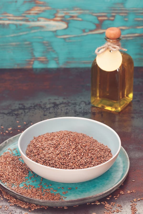 Linseed and linseed oil stock photo. Image of grain, brown - 69053194