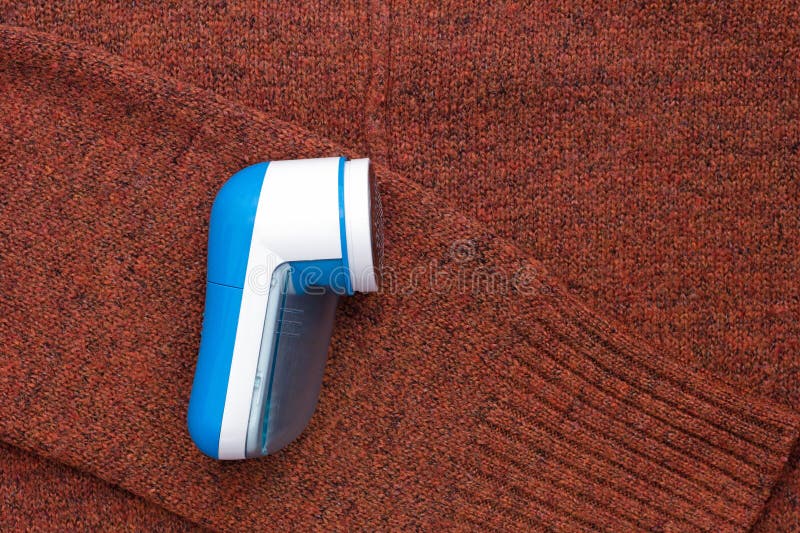 Lint Remover with Bin Full of Cutted Lint Stock Photo - Image of ...