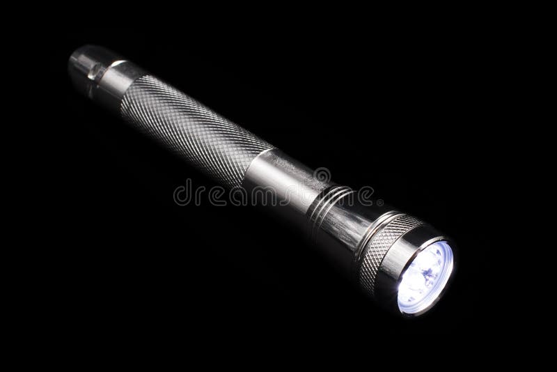 Linterna negra encendida imagen de archivo. Imagen de plástico - 64373295