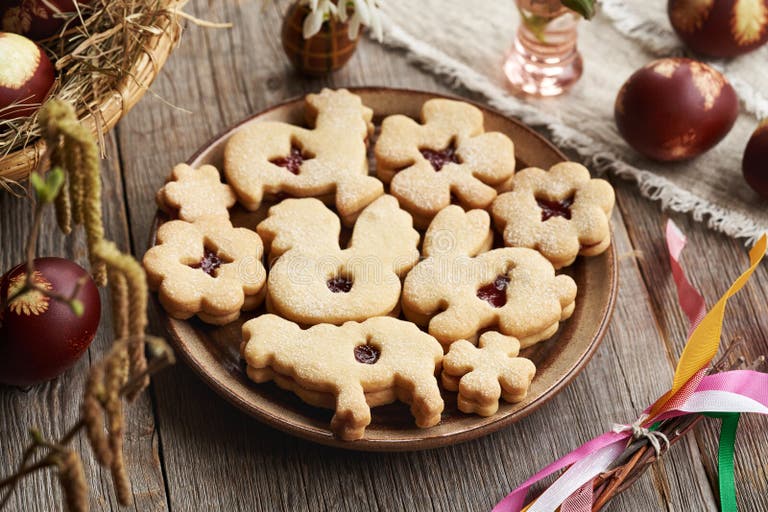 Linzer Easter Cookie in the Shape of Animals on a Plate on a Table ...