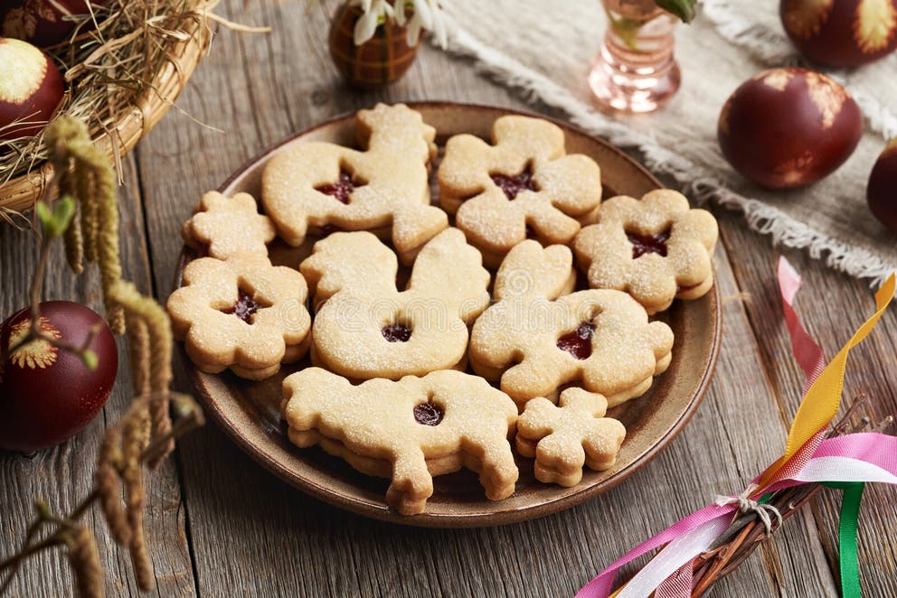 Linzer Easter Cookie in the Shape of Animals on a Plate on a Table ...
