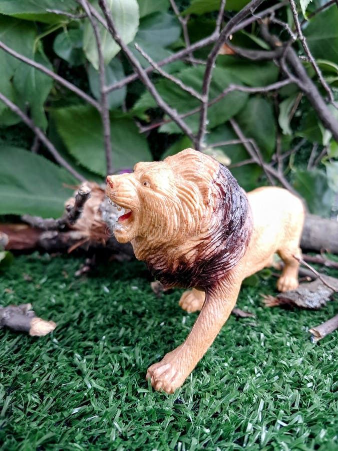 Lion Figure in a Forest Setting Stock Photo - Image of object, habitat ...