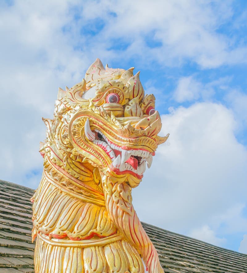 Lion Sculpture in Thai Temple with Blue Sky Stock Image - Image of ...