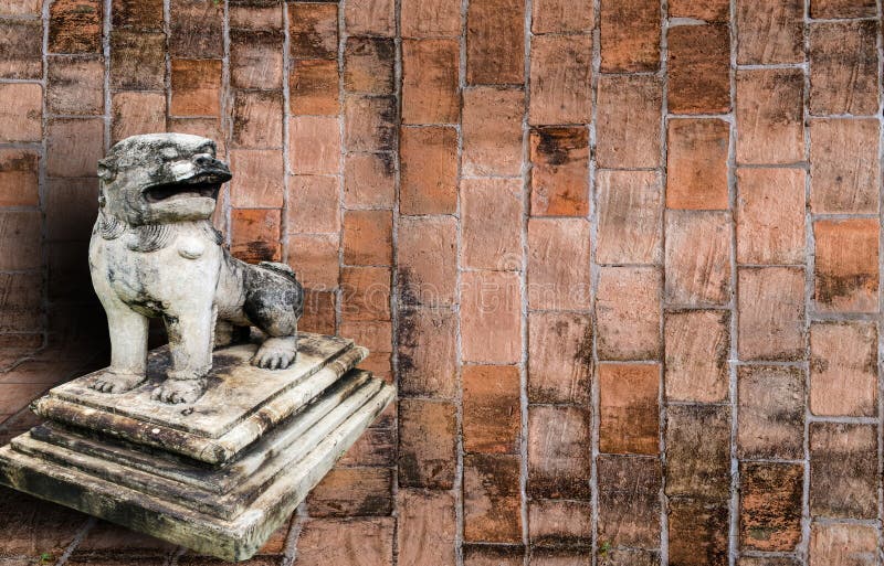Lion Statue and Old Brick Wall. Stock Photo - Image of floor, indoor ...