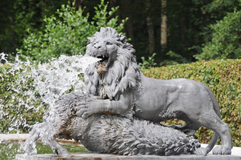 Lion Statue Spitting Water stock photo. Image of palace - 37633034
