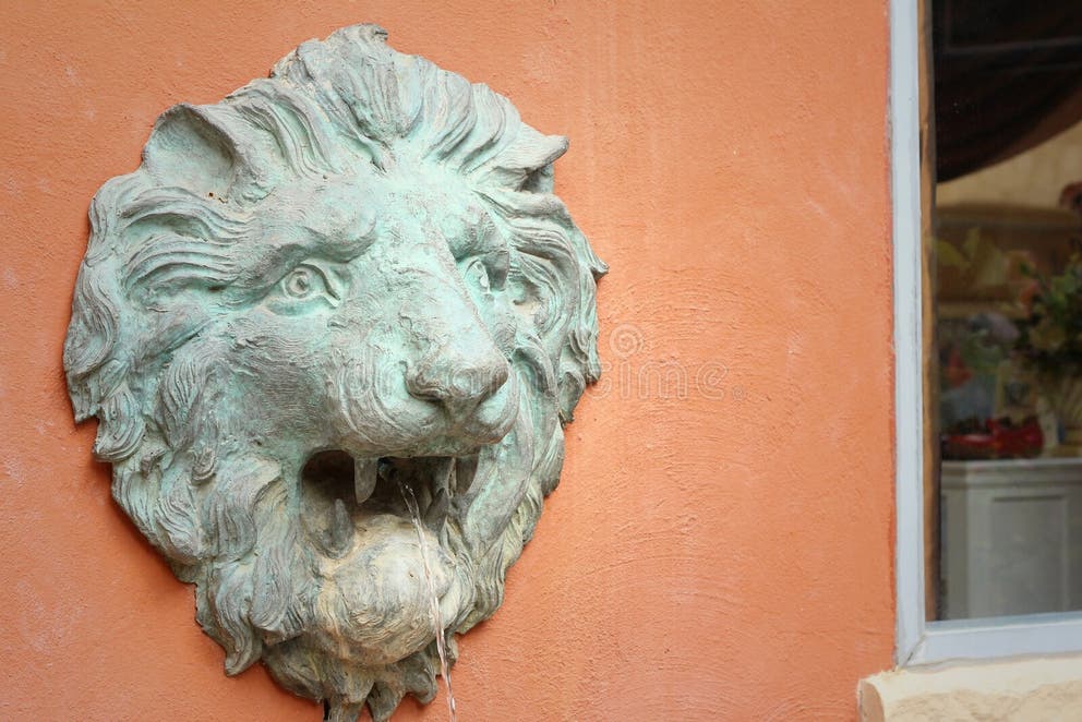 Lion Statue Spitting Water at the Park Stock Image - Image of solid ...