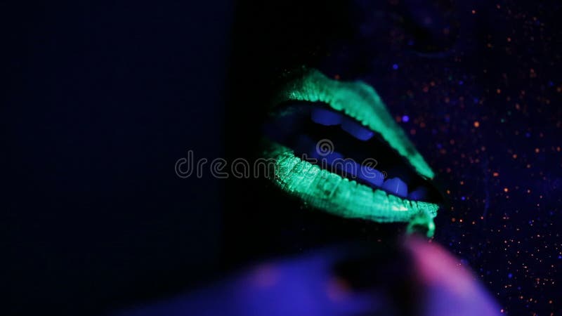 Lip Color UV Fluorescent Powder in the Light Stock Video - Video of ...