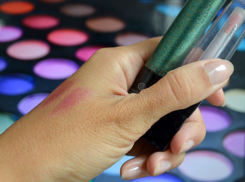 Lip Gloss. Glitter Makeup Stylist in His Hand Stock Image - Image of ...