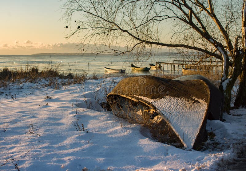 Lipovan fishing boat stock photo. Image of scenic, winter - 243774932