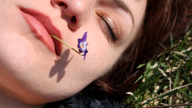Lips with flower stock photo. Image of lays, grass, relaxation - 9324960