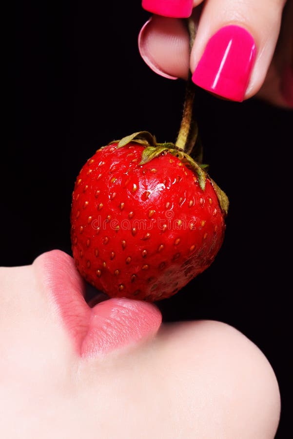 Lips with strawberry. stock photo. Image of lipstick - 44430084